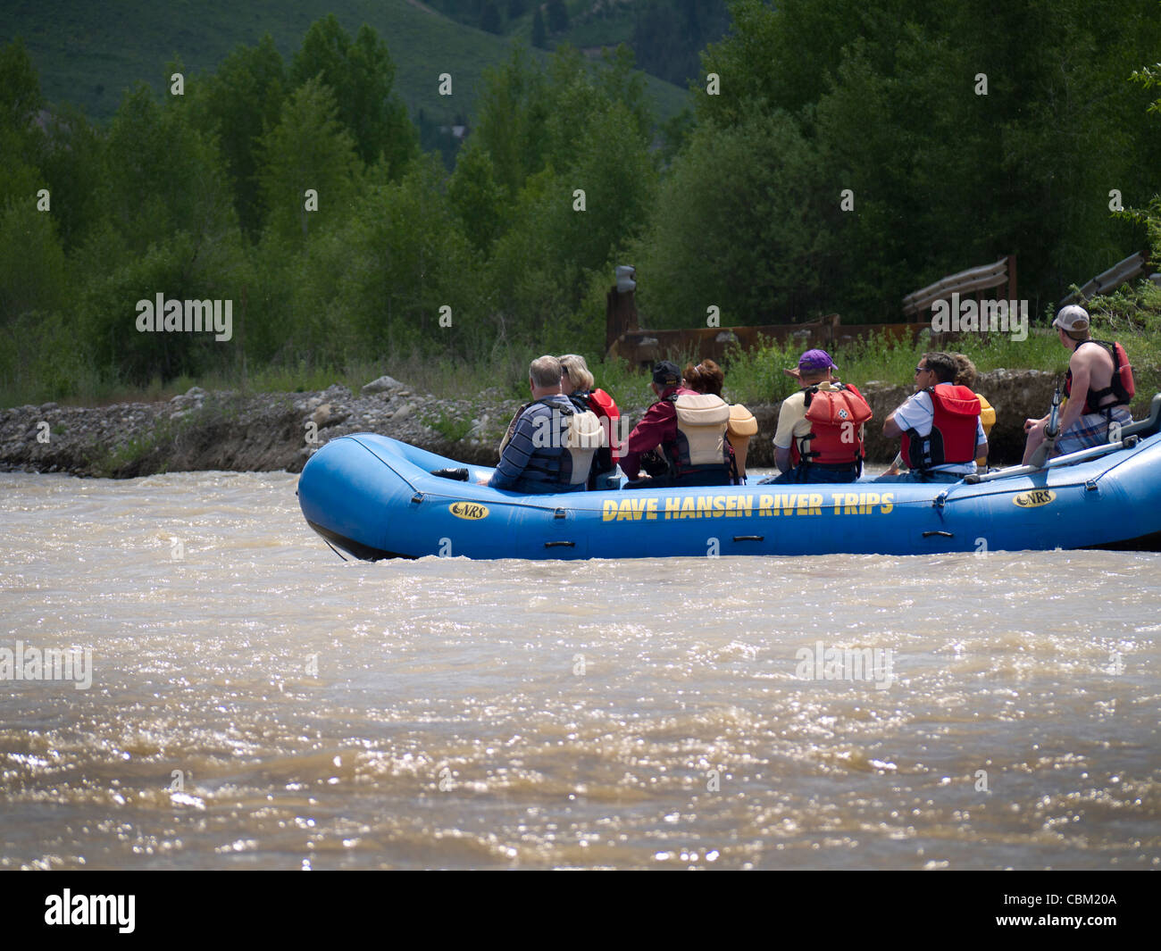Rafting on the Snake River through the Grand Tetons National Park ...