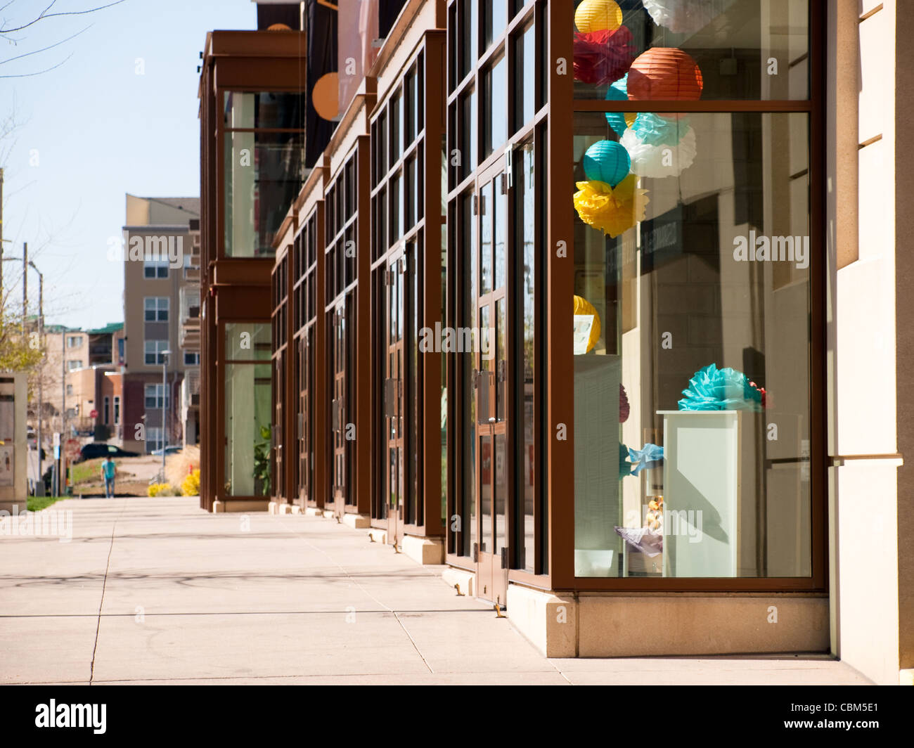 Dtorefront of retail store in mixed use development Stock Photo - Alamy