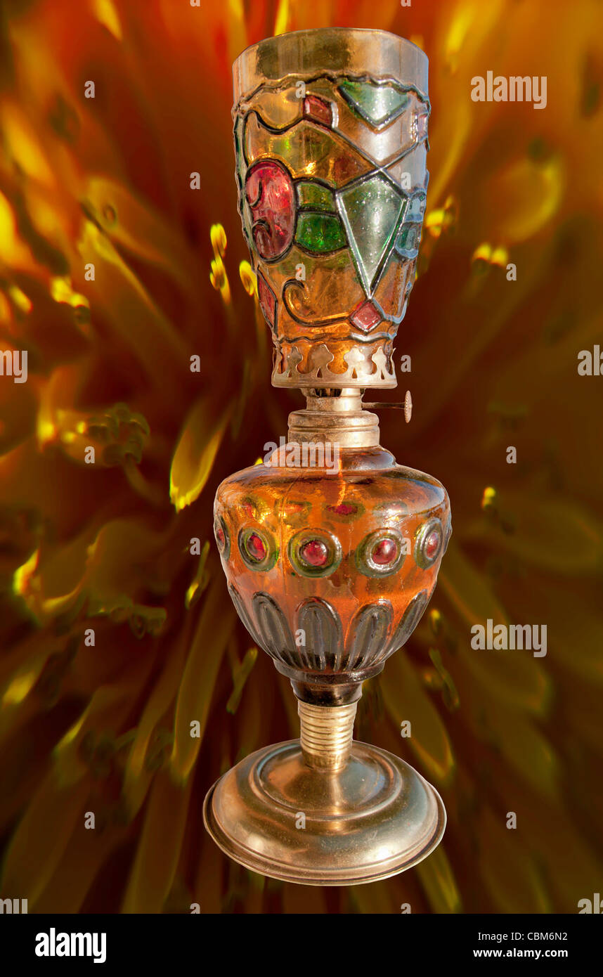 antique three colors oil lamp isolated on texture background Stock ...