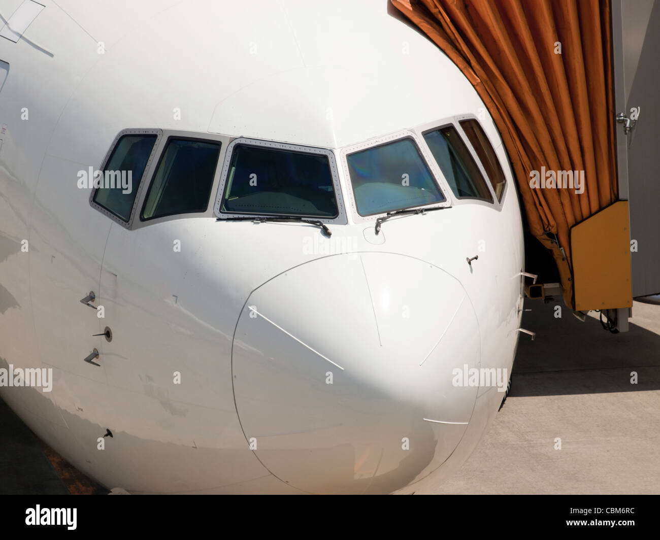 Front of the commercial airplane Stock Photo - Alamy