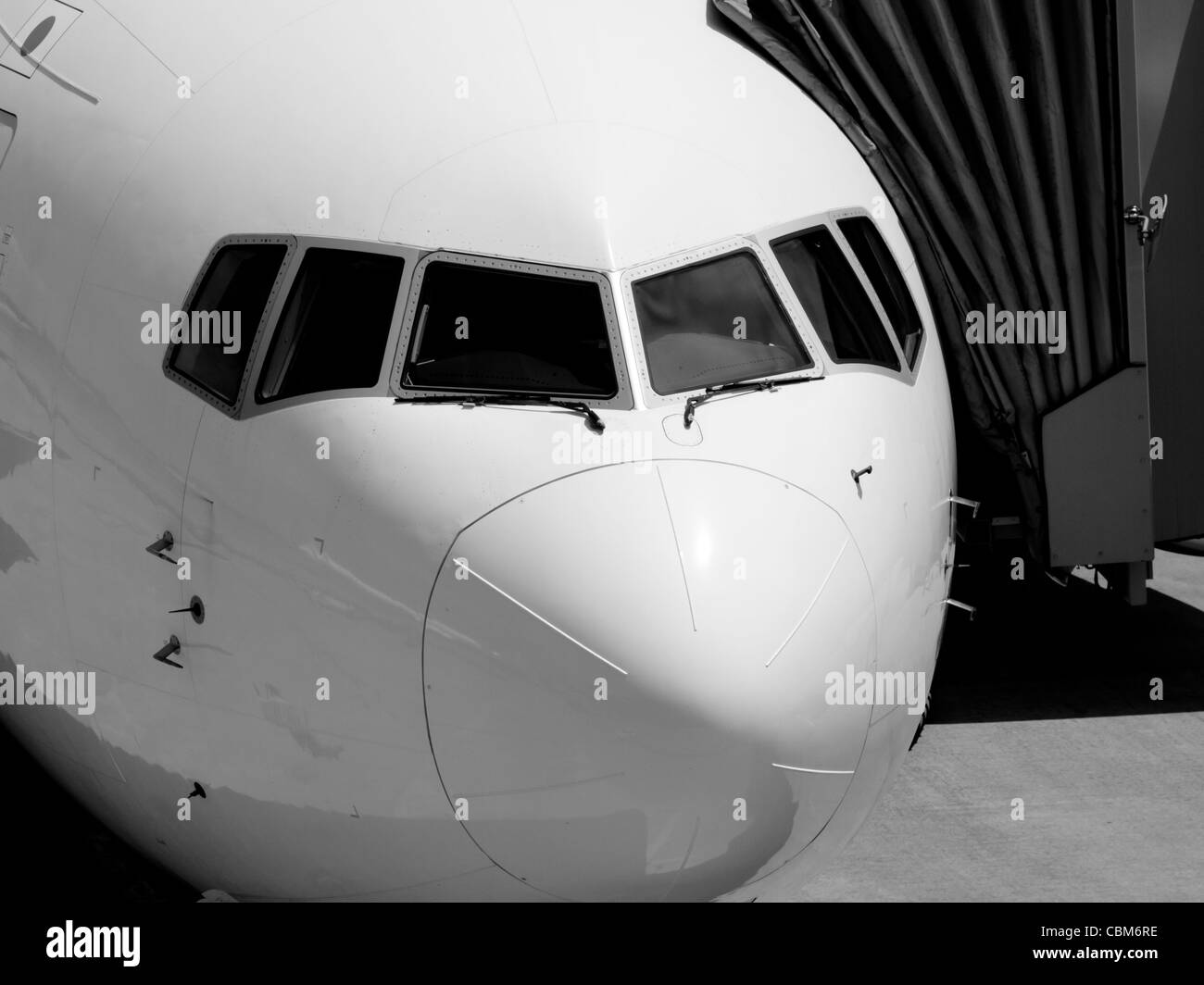 Front of the commercial airplane Stock Photo - Alamy