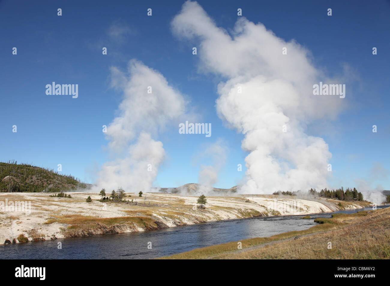 Steam rising over Midway Geyser Basin geothermal area, Yellowstone ...