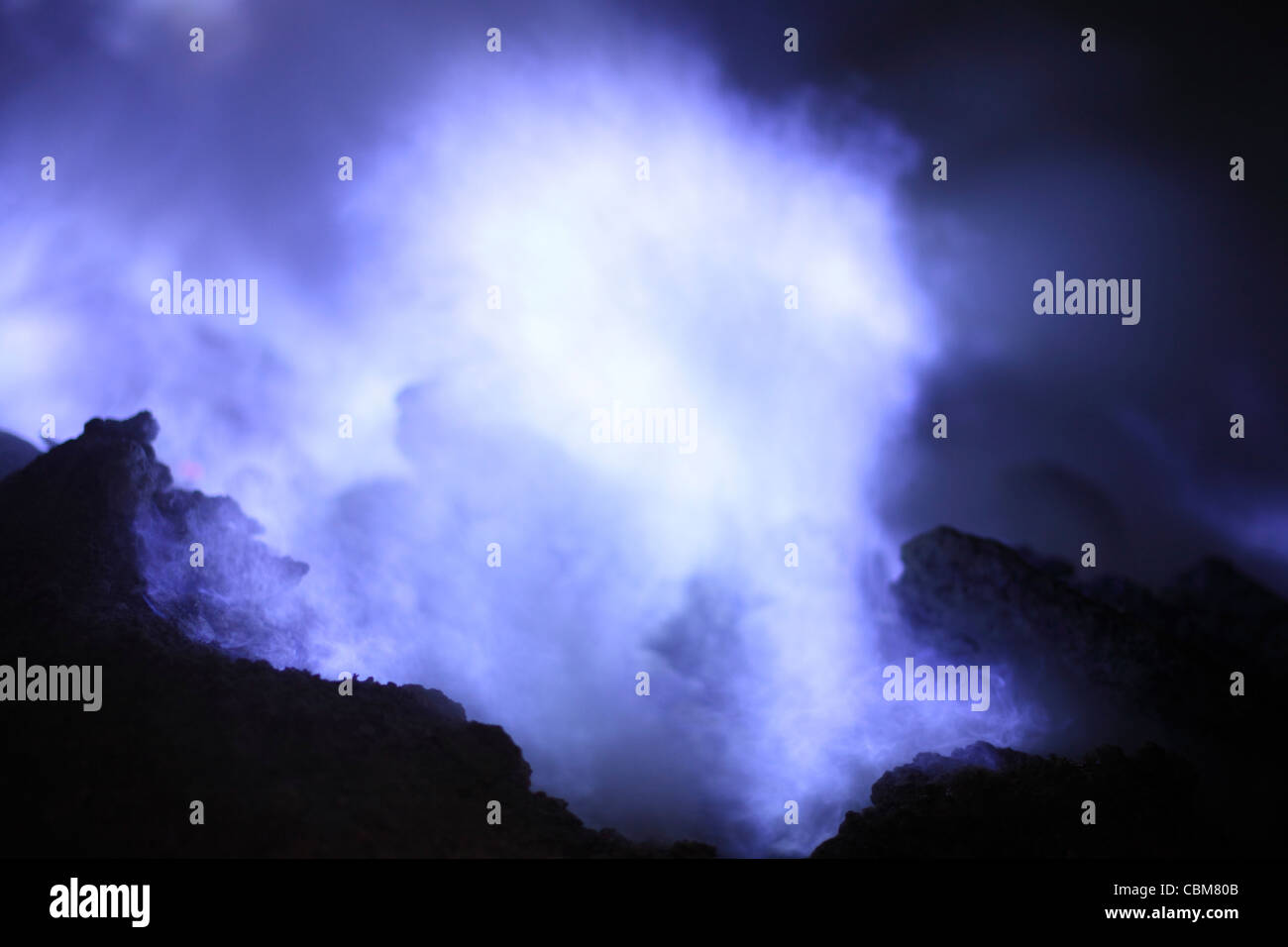 August 12, 2011 - Blue flames of burning sulphur on Kawah Ijen Volcano ...