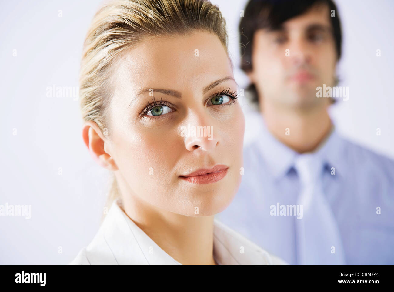 young successful business people looking at camera Stock Photo - Alamy
