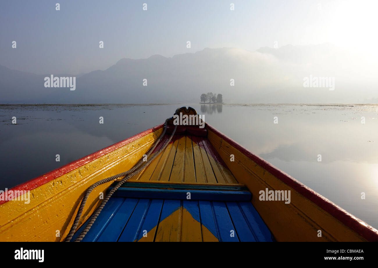 The little island of Char Chinar is seen over the prow of a shikara in ...