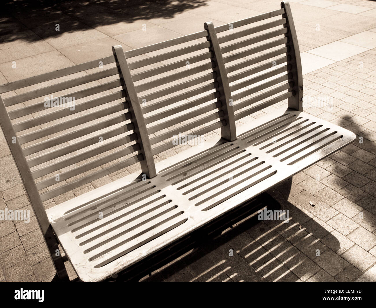 Contemporary park bench Stock Photo - Alamy