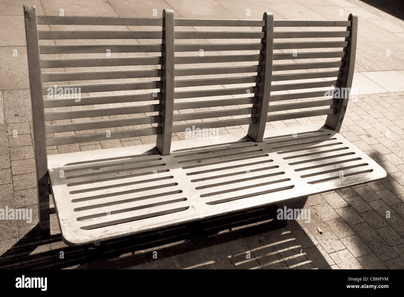 Contemporary park bench Stock Photo - Alamy