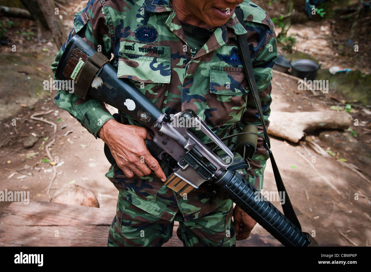 A soldier with his weapon Stock Photo - Alamy
