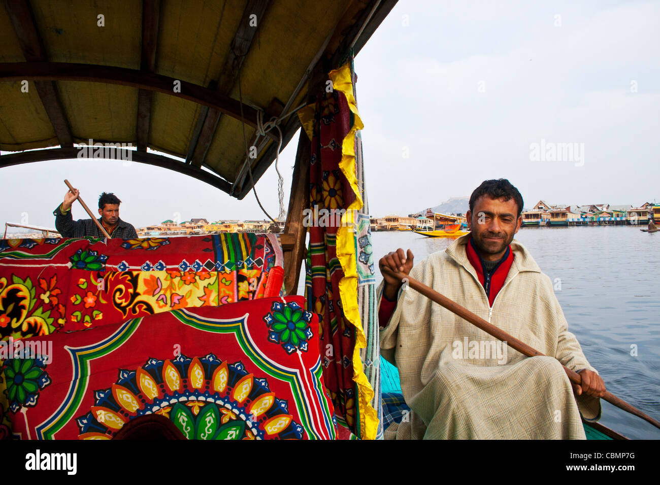 Oarsmen in a shikara boat, Dal Lake, Srinagar Stock Photo - Alamy