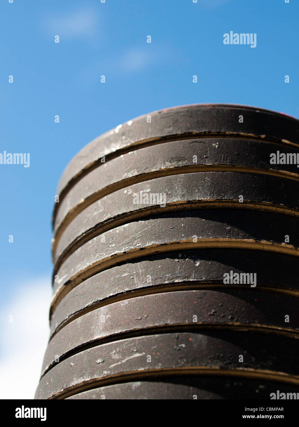 Stack of orange clay pigeons Stock Photo - Alamy