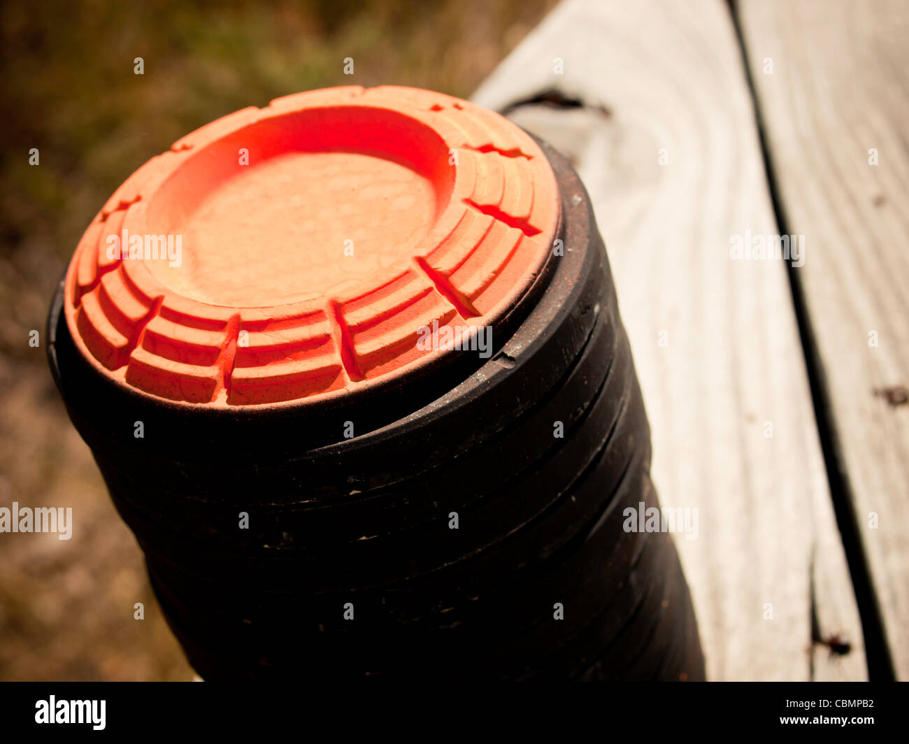 Stack of orange clay pigeons Stock Photo - Alamy
