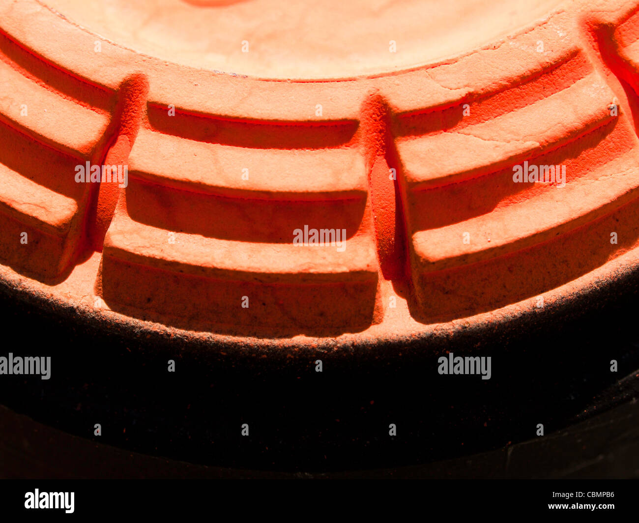 Stack of orange clay pigeons Stock Photo - Alamy