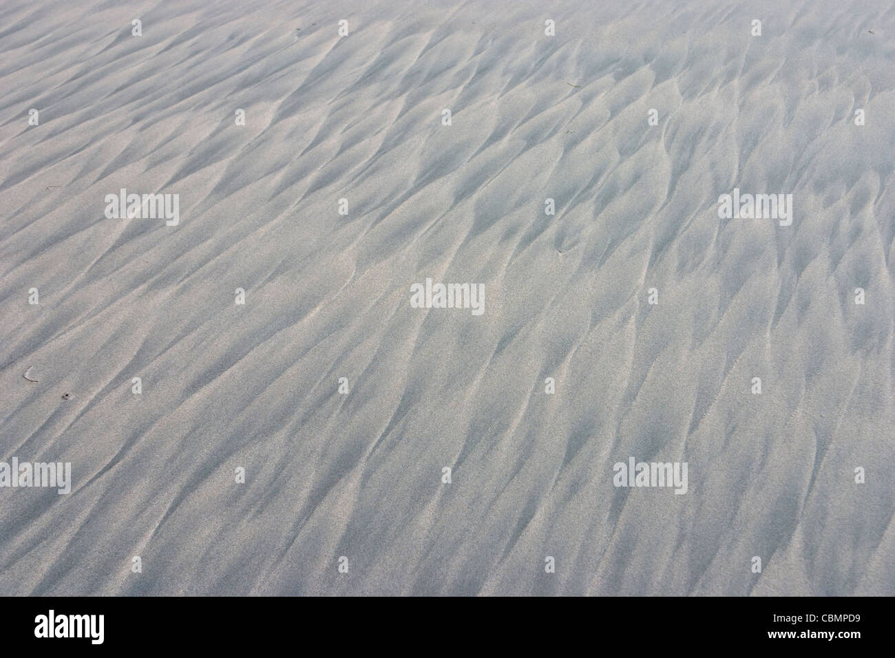 Patterns formed in black and white sand, Wharariki Beach, New Zealand ...