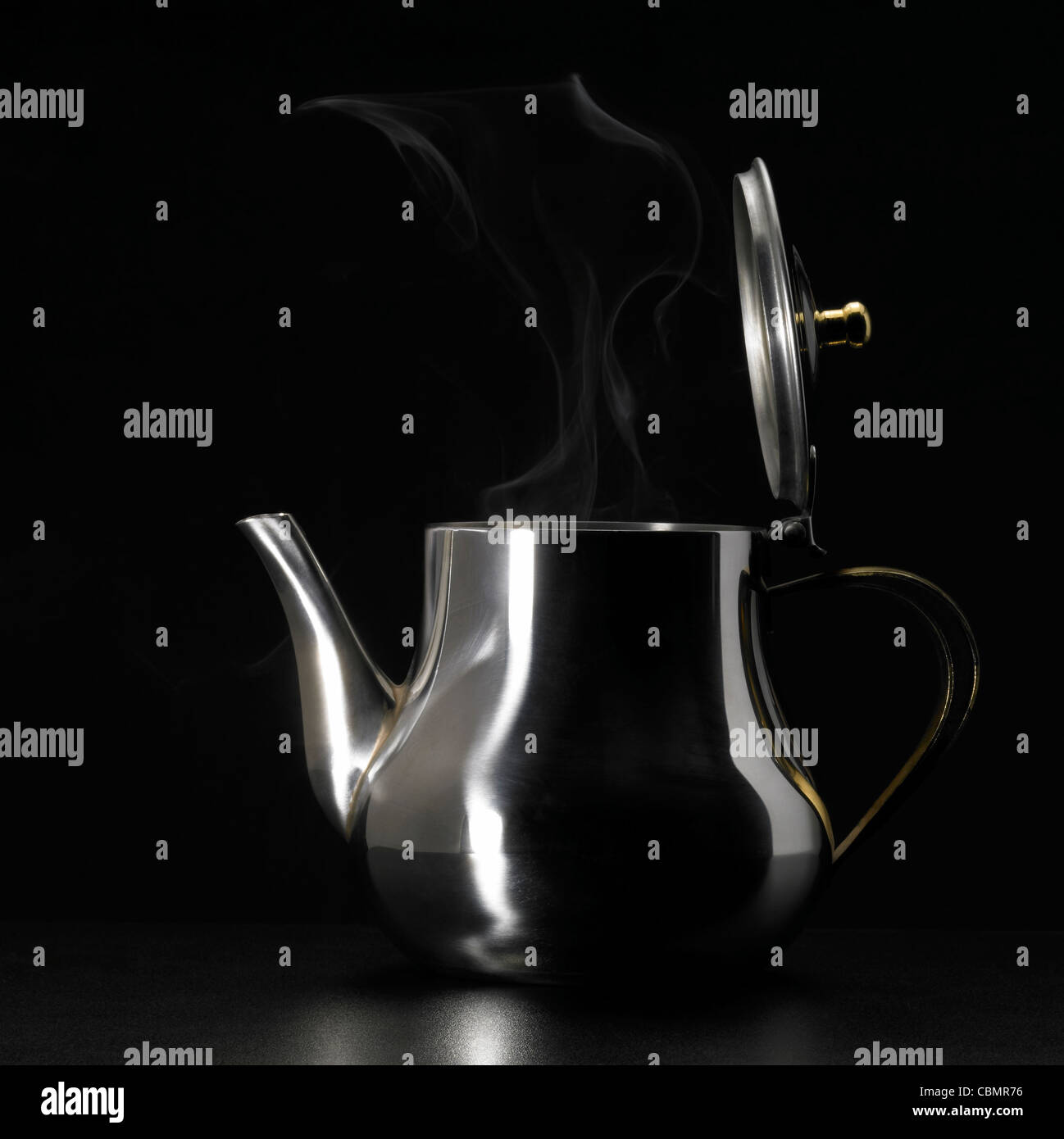 Metal shiny teapot hi-res stock photography and images - Alamy