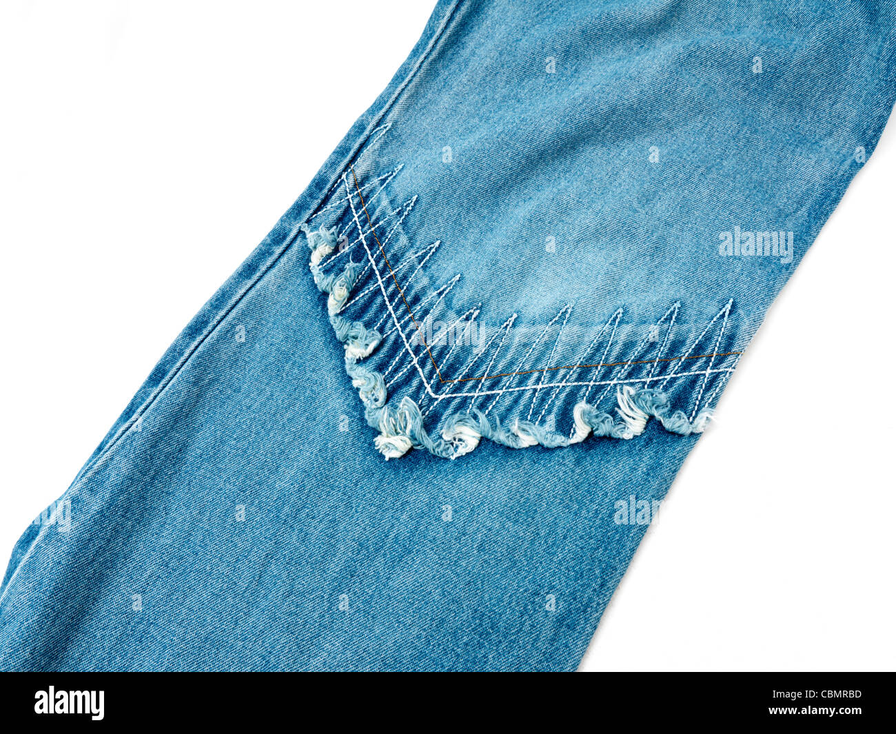 French Gypsy Jeans With Fringed Pattern On Knee Stock Photo - Alamy