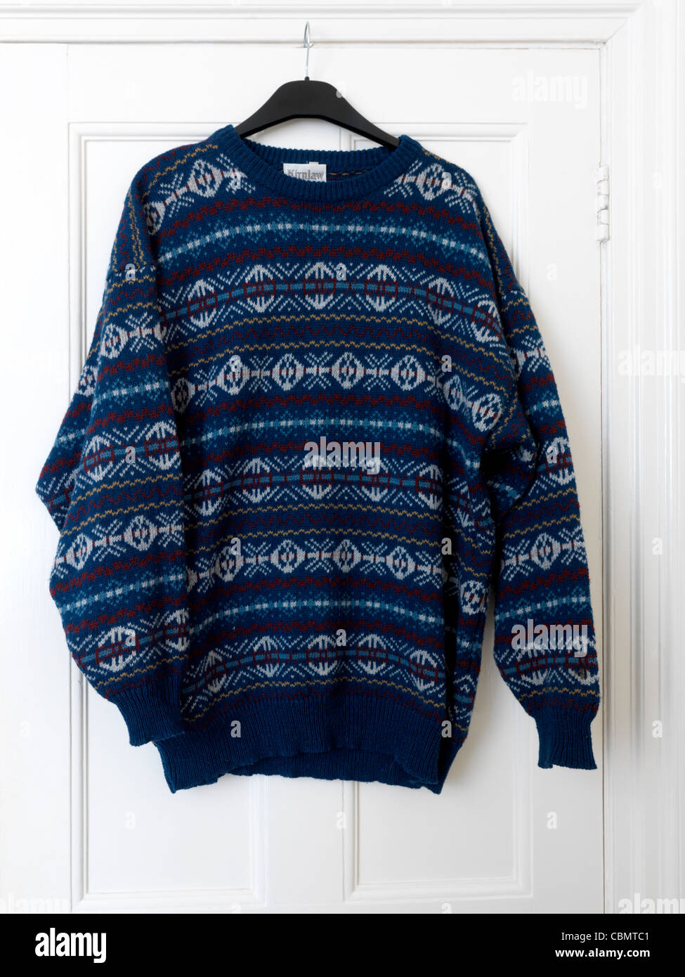 Wool jumper on a hanger hi-res stock photography and images - Alamy