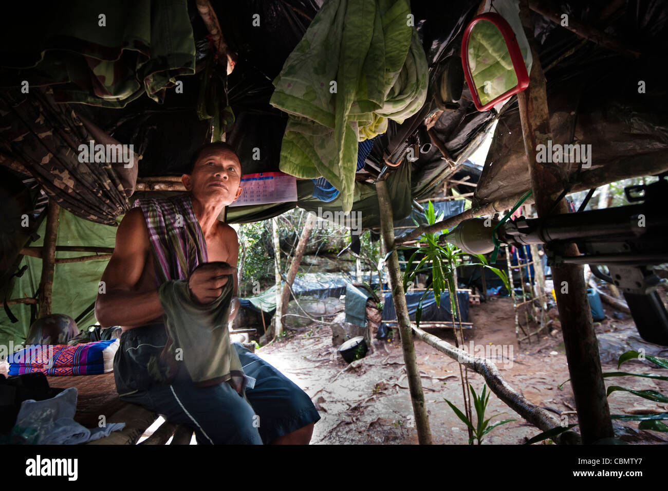 A Thai soldier in a military checkpoint by the Cambodian border Stock ...
