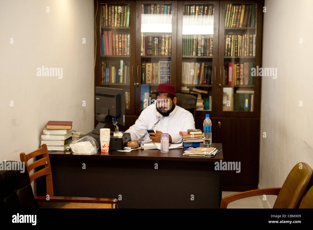 An imam of the Kowloon Mosque in his office Stock Photo - Alamy
