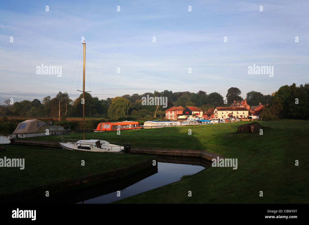 A scene on the Norfolk Broads in early morning light at Coltishall ...