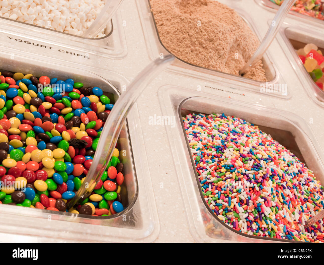Toppings for frozen yogurt Stock Photo - Alamy