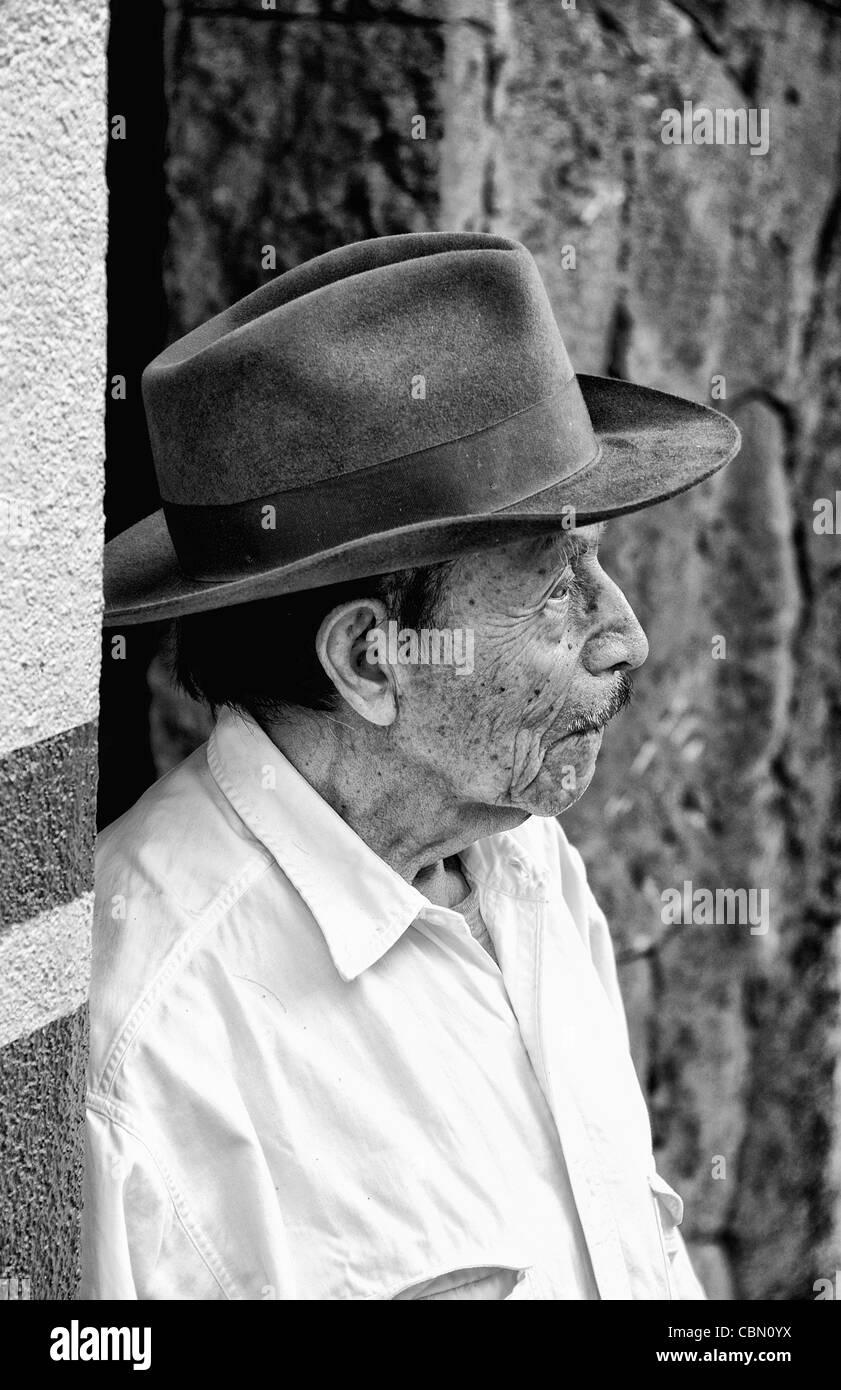 Local humble poor man portrait with cowboy hat in Lake Atitlan village ...