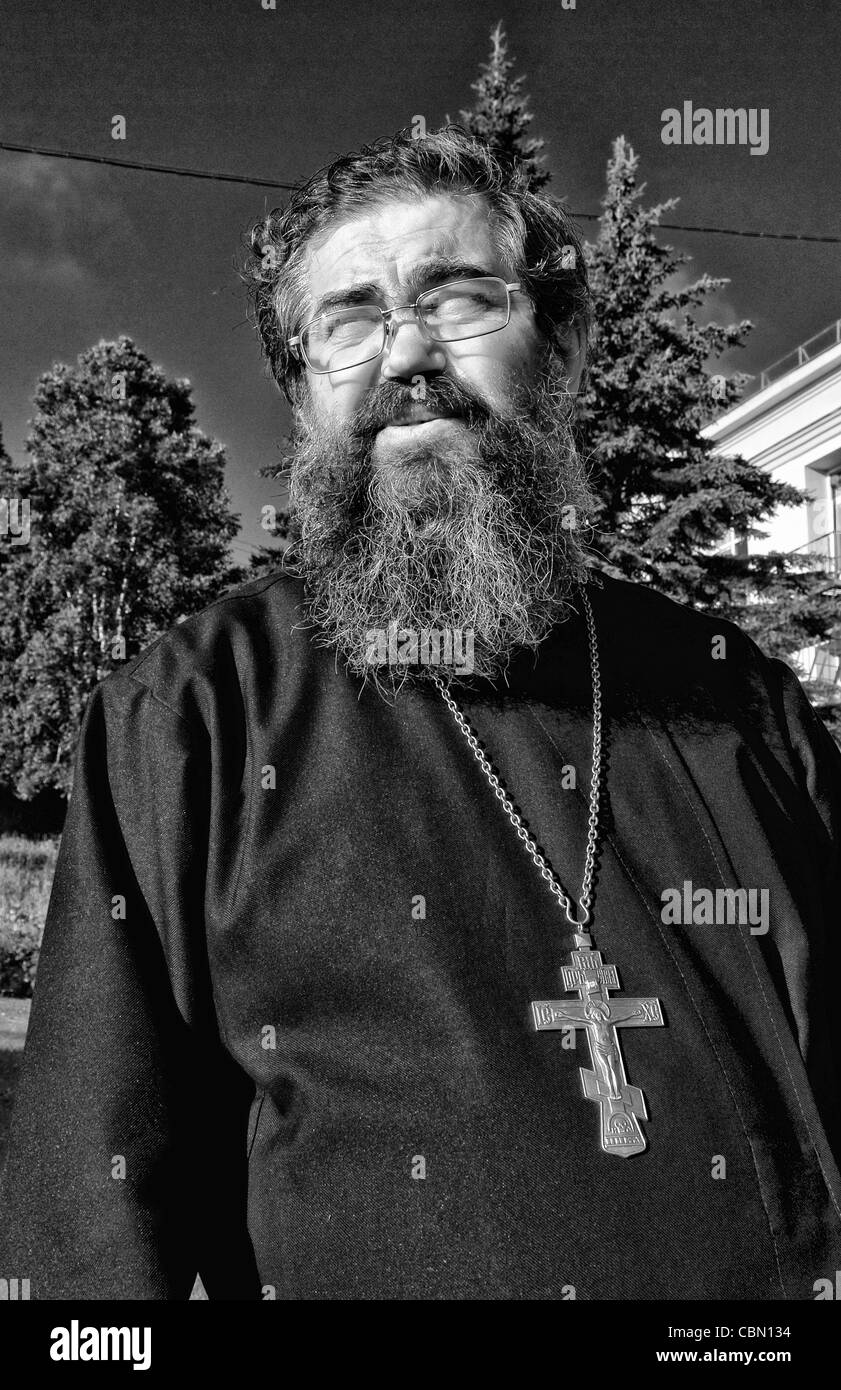Portrait of Priest in Russian Orthodox Church in Beautiful old wooden ...