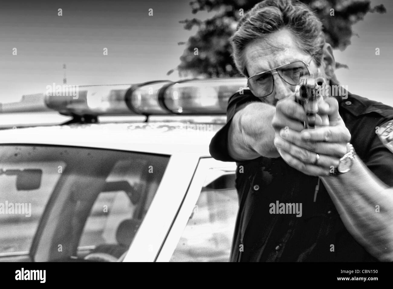 Officer gun Black and White Stock Photos & Images - Alamy