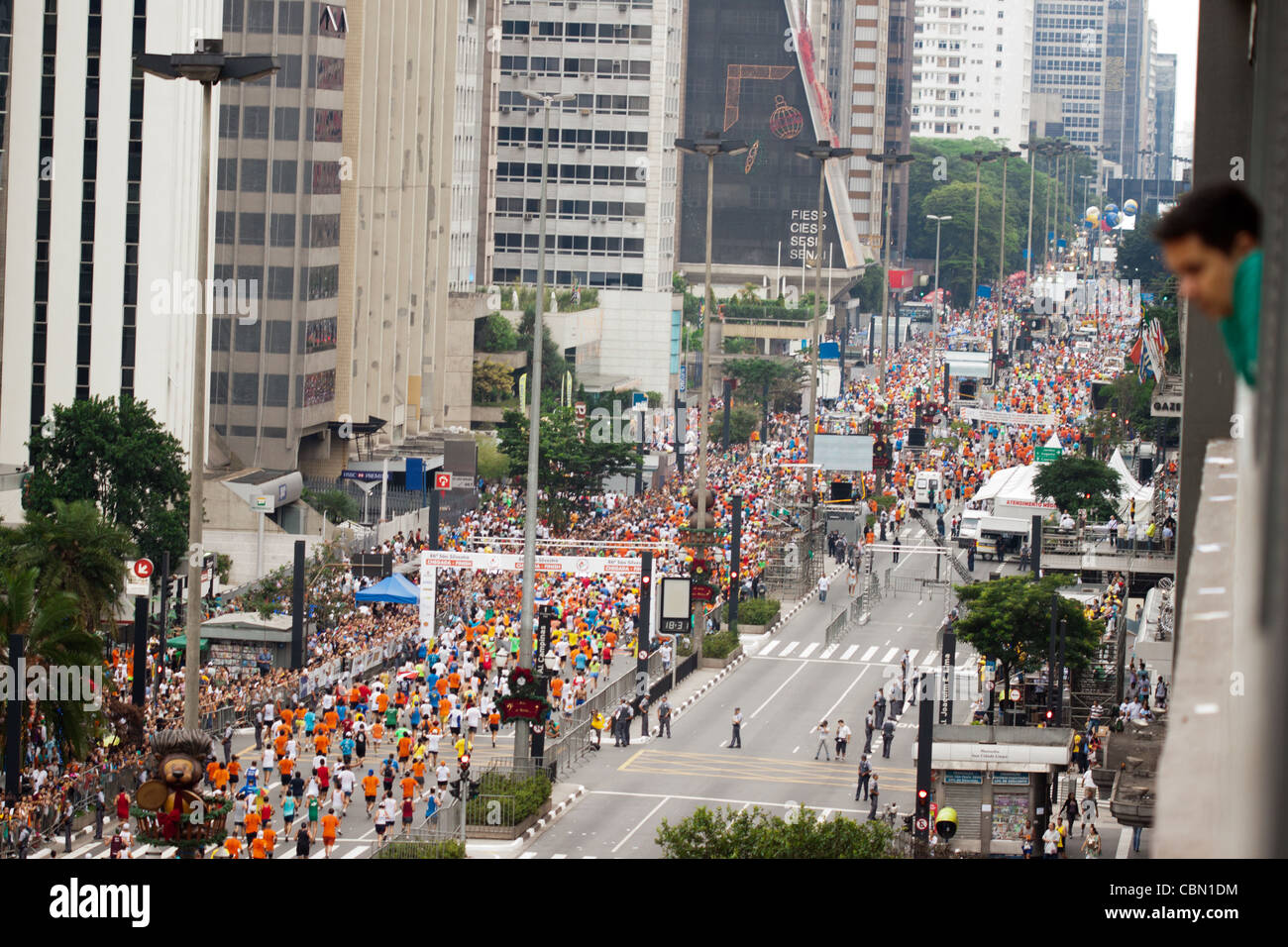 A man watching the finishing line of the Saint Silvester running Stock ...