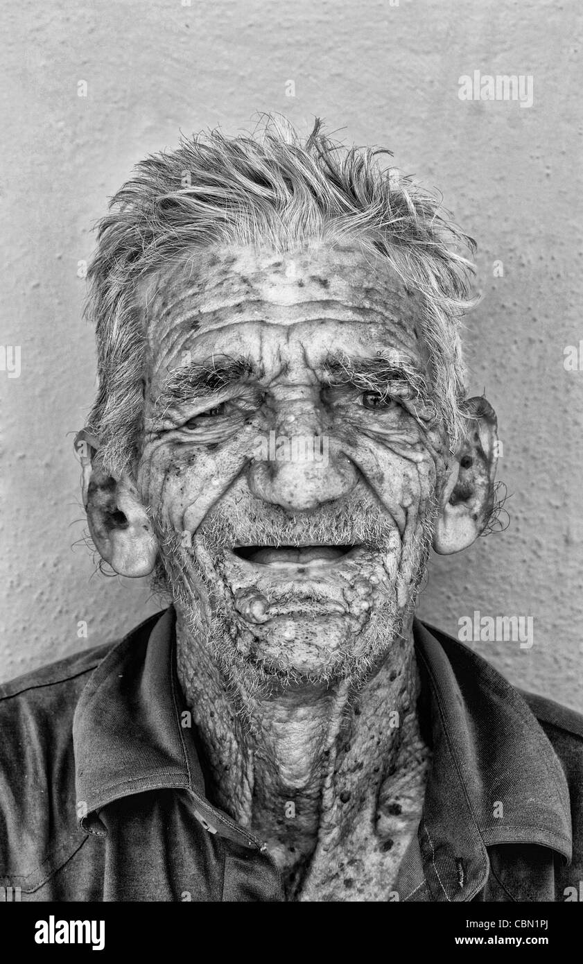 Old man with wrinkles portrait in old colonial village of Trinidad Cuba ...