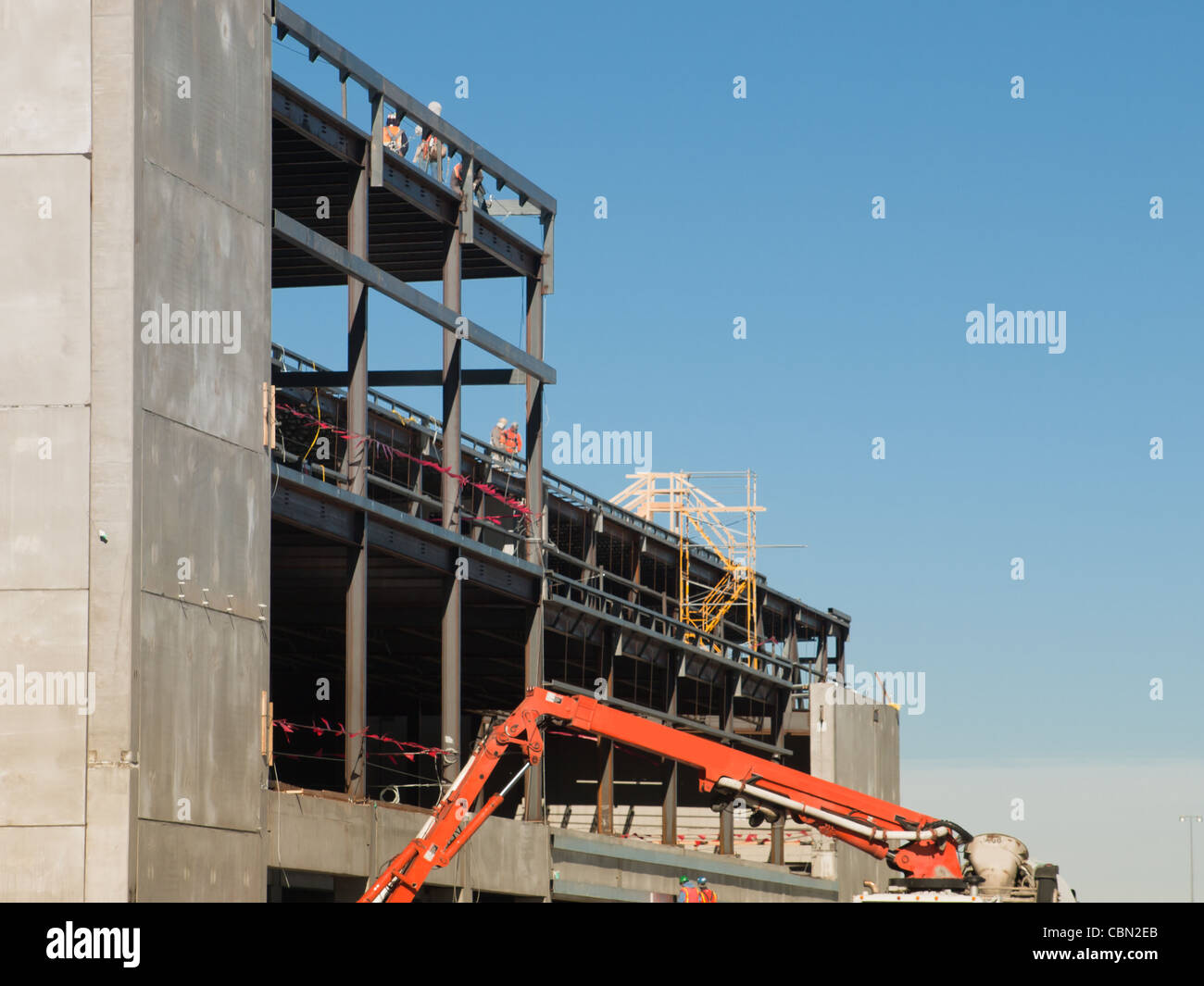 Construction site of the new retail building. Steel frame construction ...