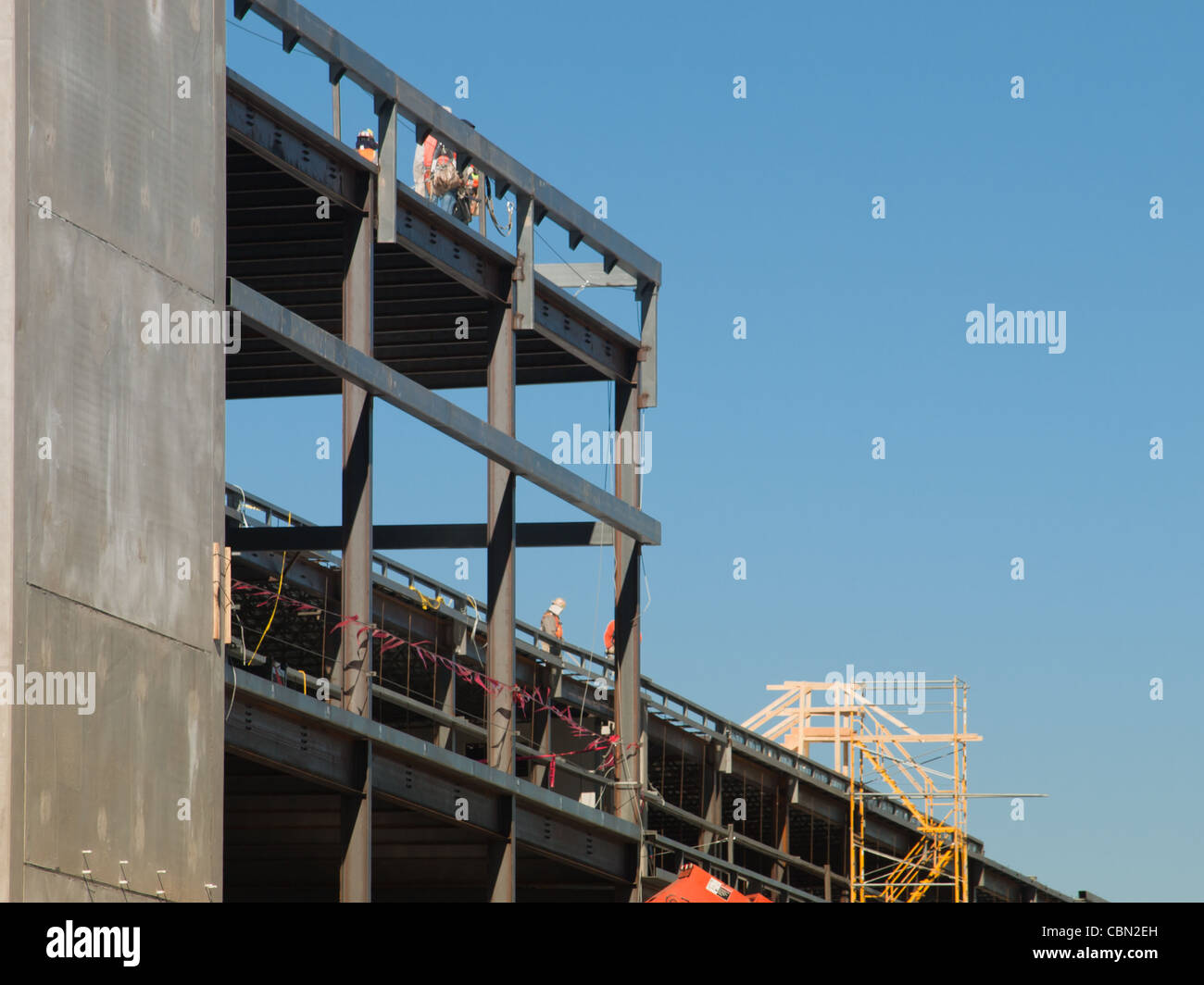 Construction site of the new retail building. Steel frame construction ...