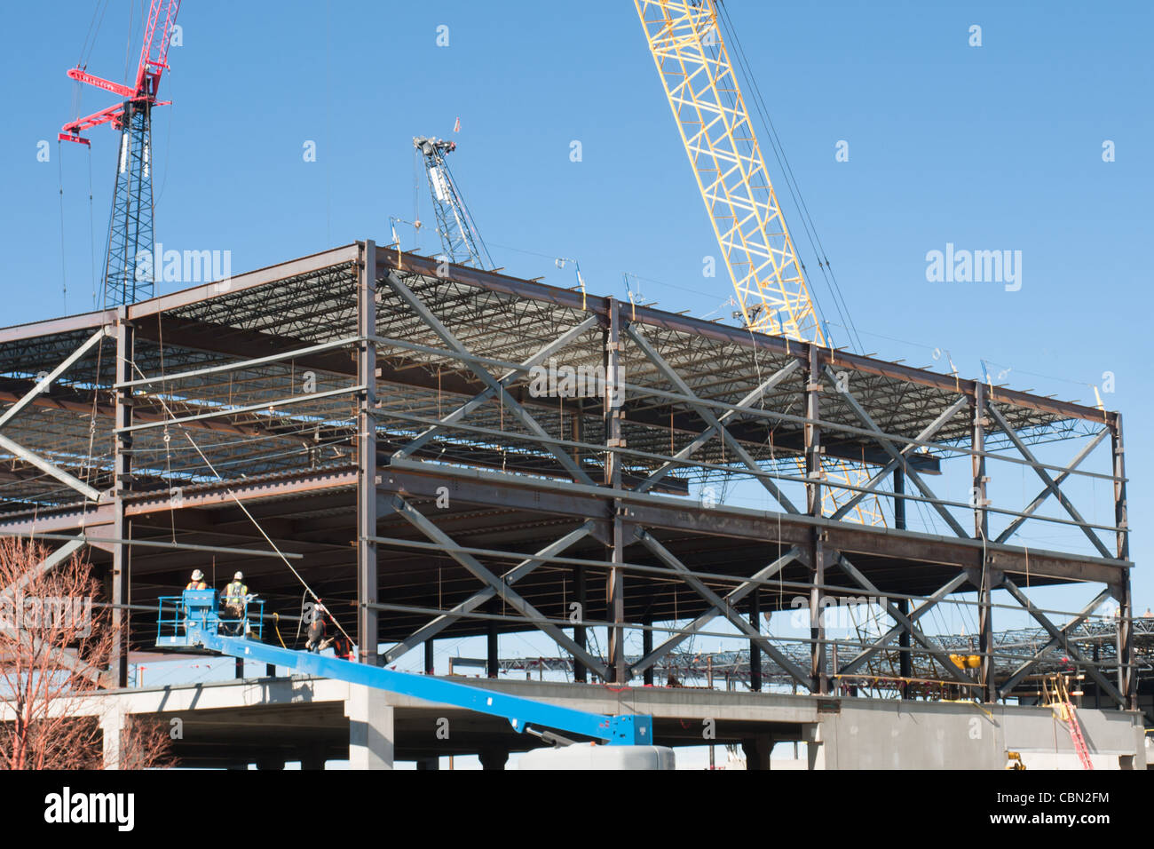 Construction site of the new retail building. Steel frame construction ...