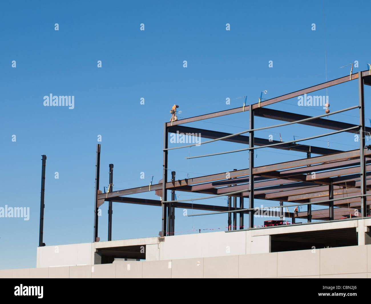 Construction site of the new retail building. Steel frame construction ...