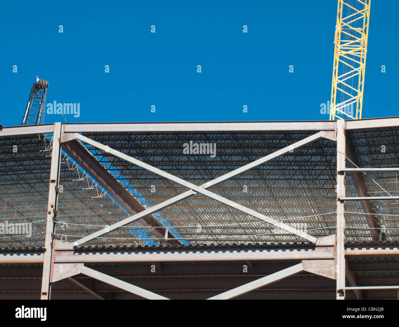 Construction site of the new retail building. Steel frame construction ...