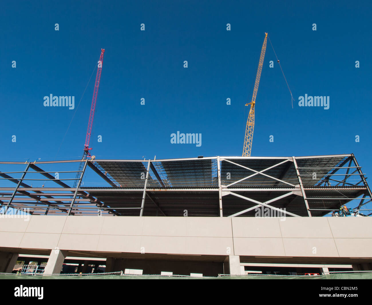 Construction site of the new retail building. Steel frame construction ...