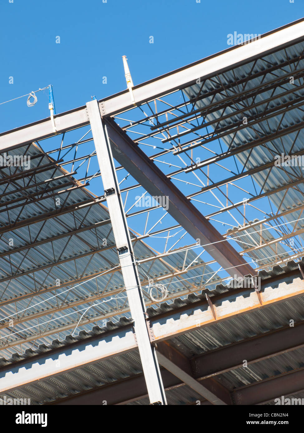 Construction site of the new retail building. Steel frame construction ...