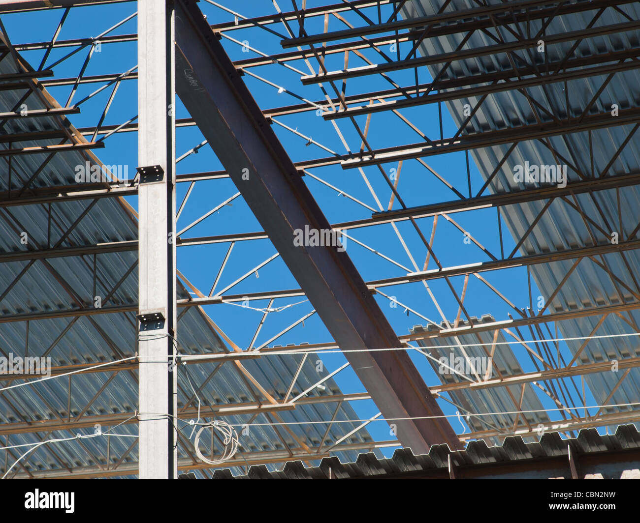 Construction site of the new retail building. Steel frame construction ...