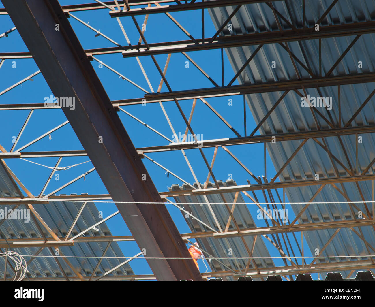 Construction site of the new retail building. Steel frame construction ...