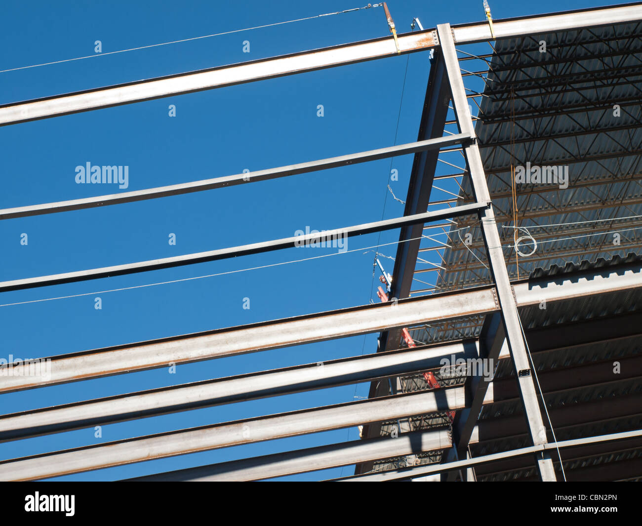 Construction site of the new retail building. Steel frame construction ...