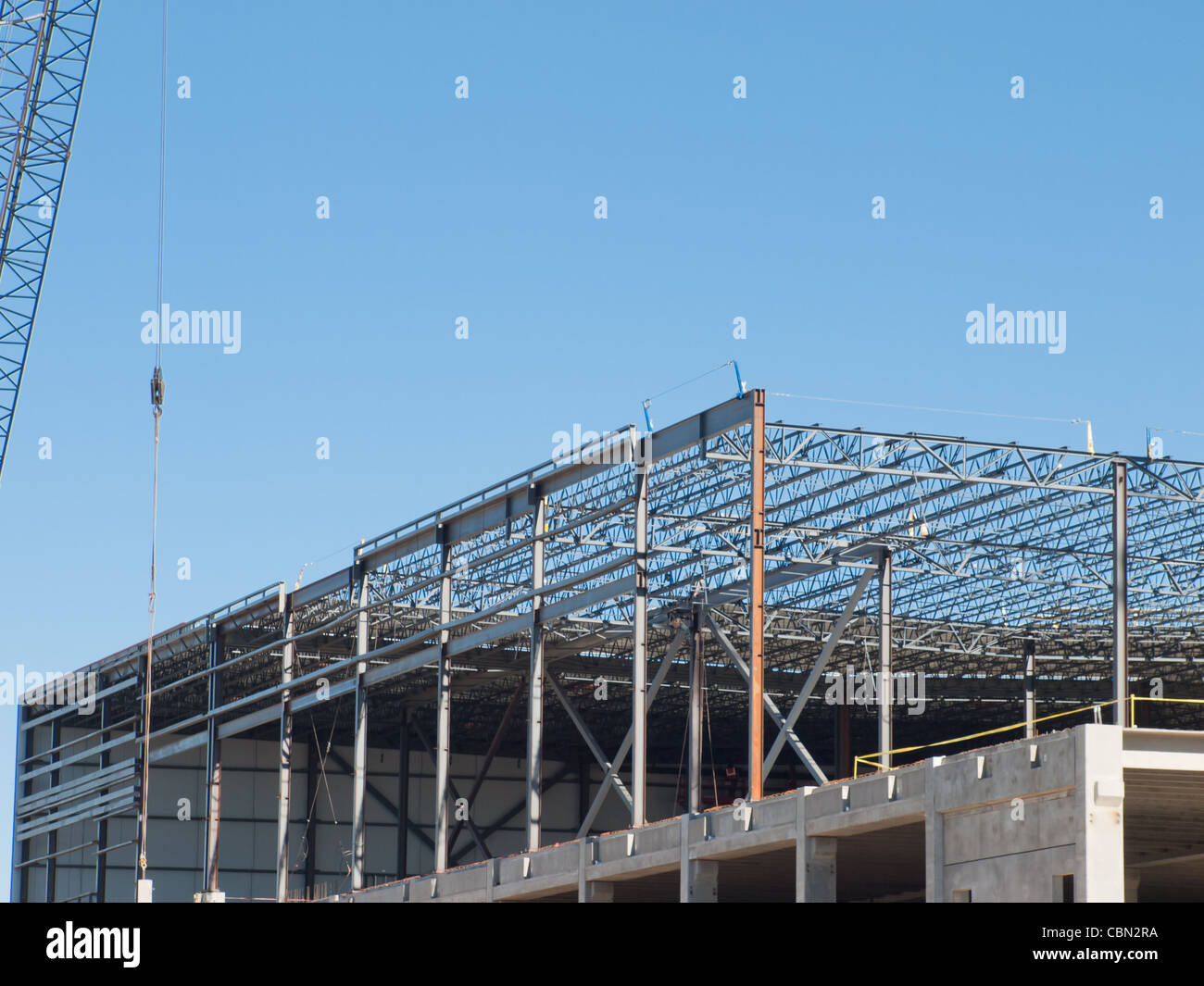 Construction site of the new retail building. Steel frame construction ...
