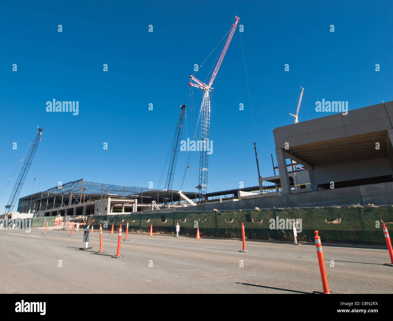Construction site of the new retail building. Steel frame construction ...