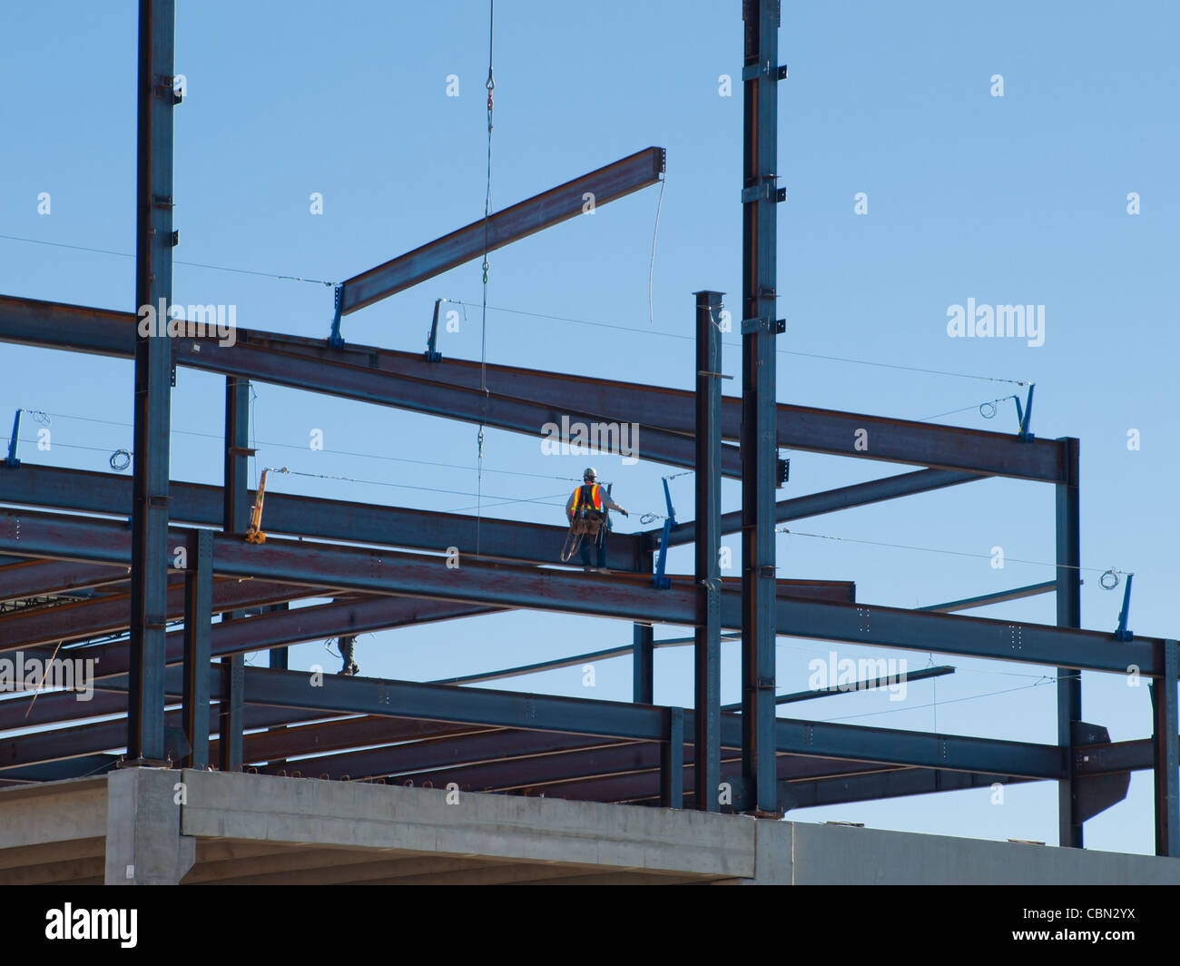 Construction site of the new retail building. Steel frame construction ...