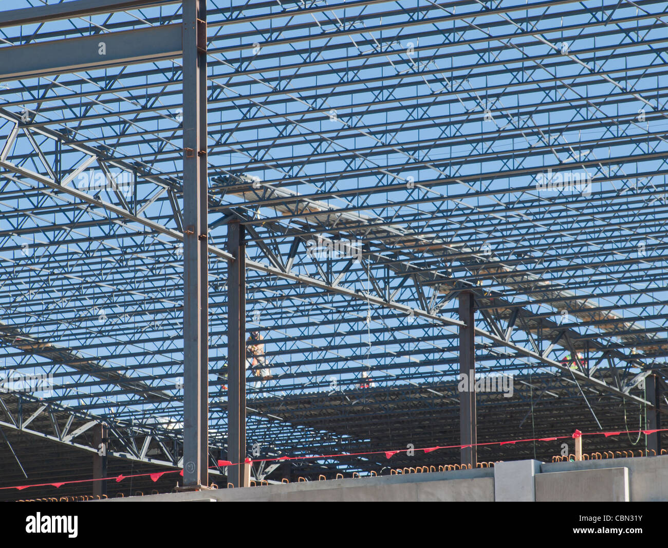 Construction site of the new retail building. Steel frame construction ...
