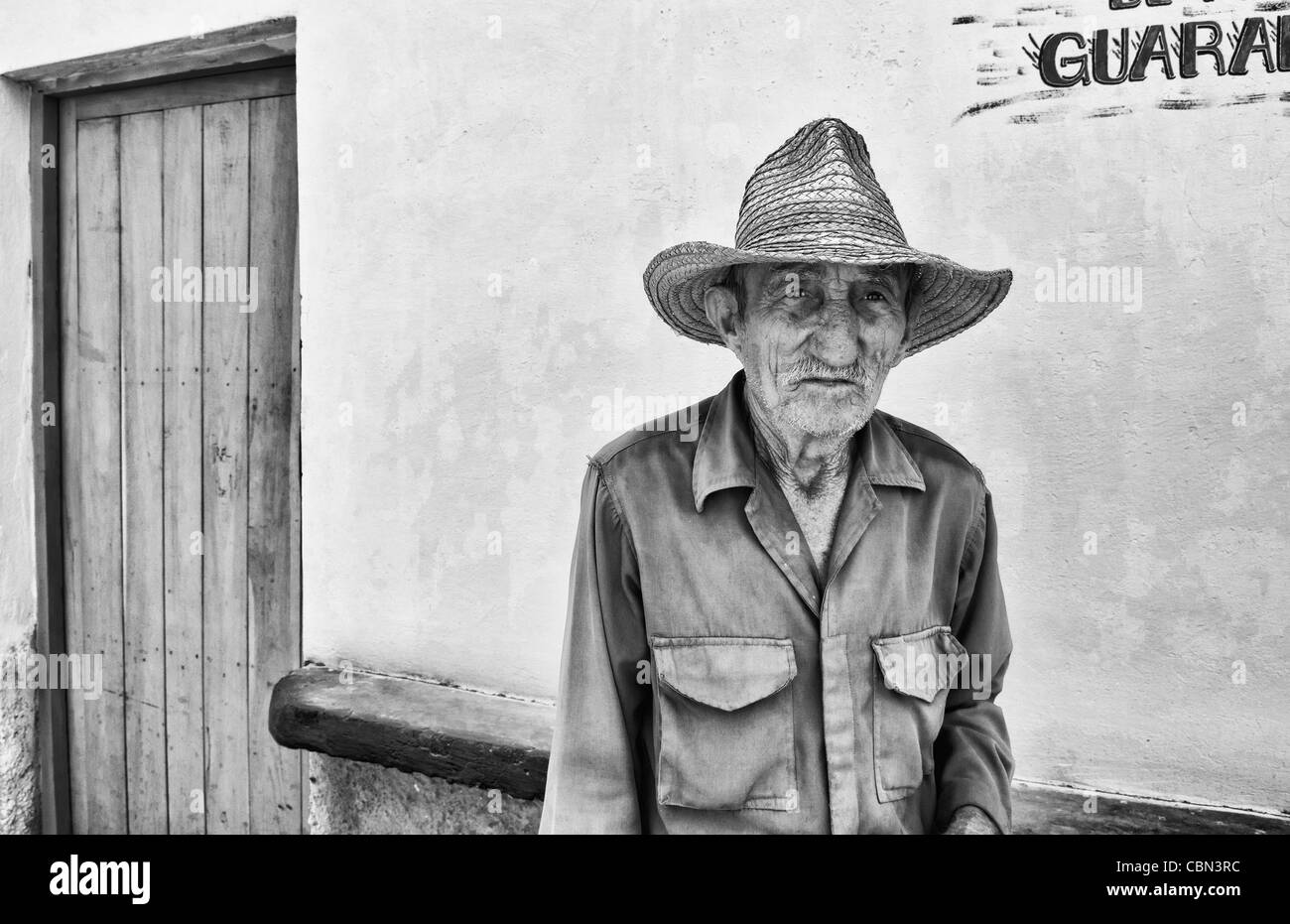 Portrait of poor man with straw hat in small town of Australia Cuba ...
