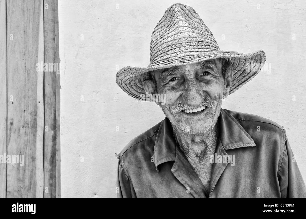 Portrait of poor man with straw hat in small town of Australia Cuba ...