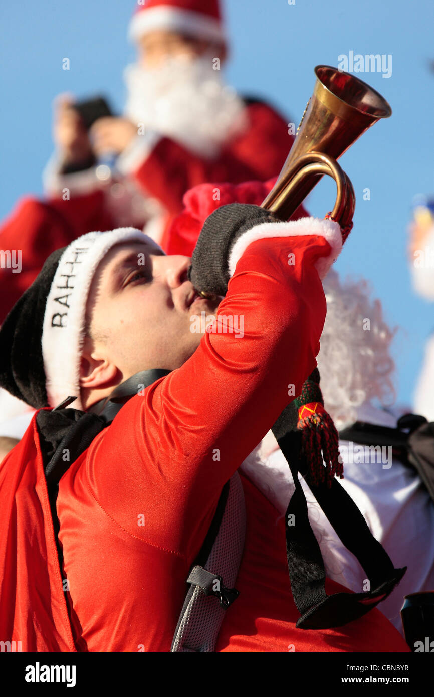 Reveler dressed in Santa Costume at Santa Mob London 2011 Stock Photo ...
