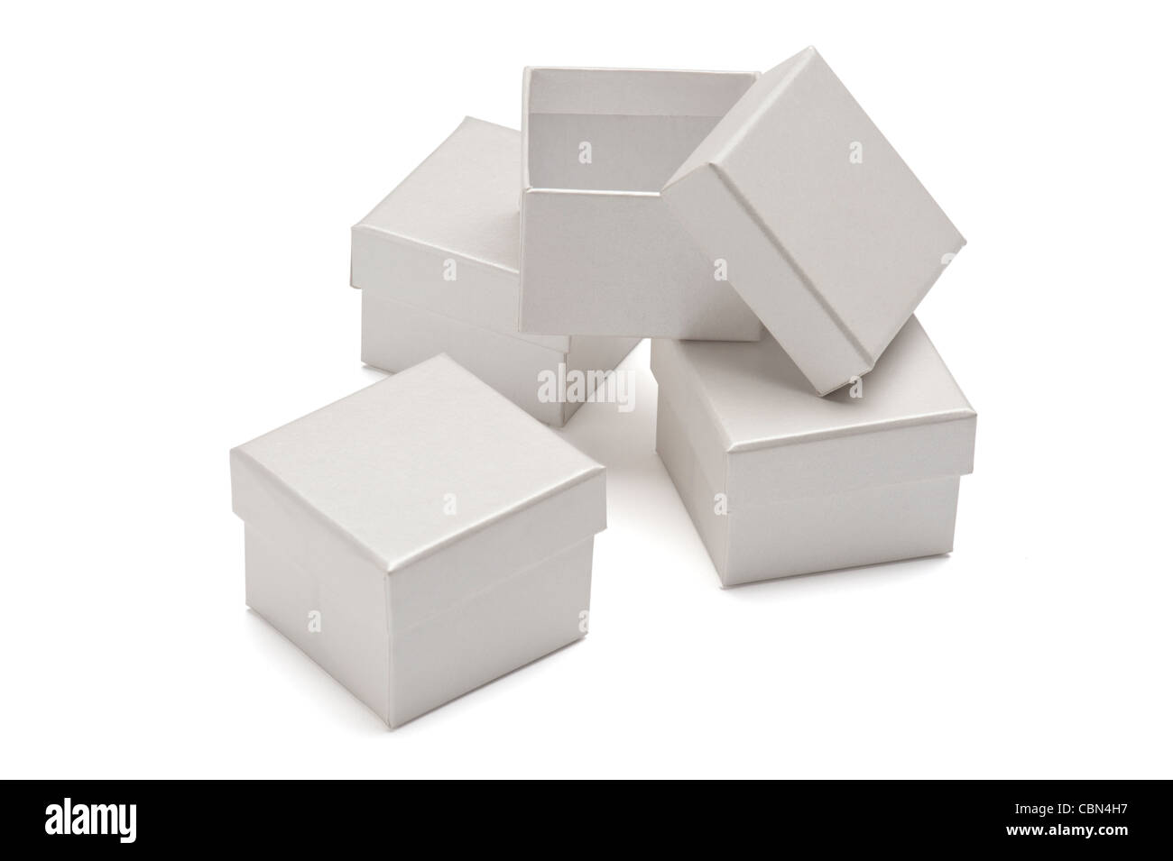 Four small gift boxes Stock Photo - Alamy