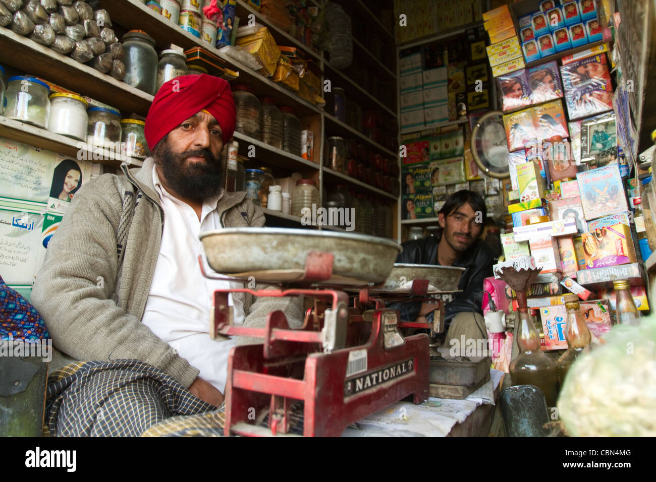 Small shop with Sikh people in Kabul Afghanistan Stock Photo - Alamy