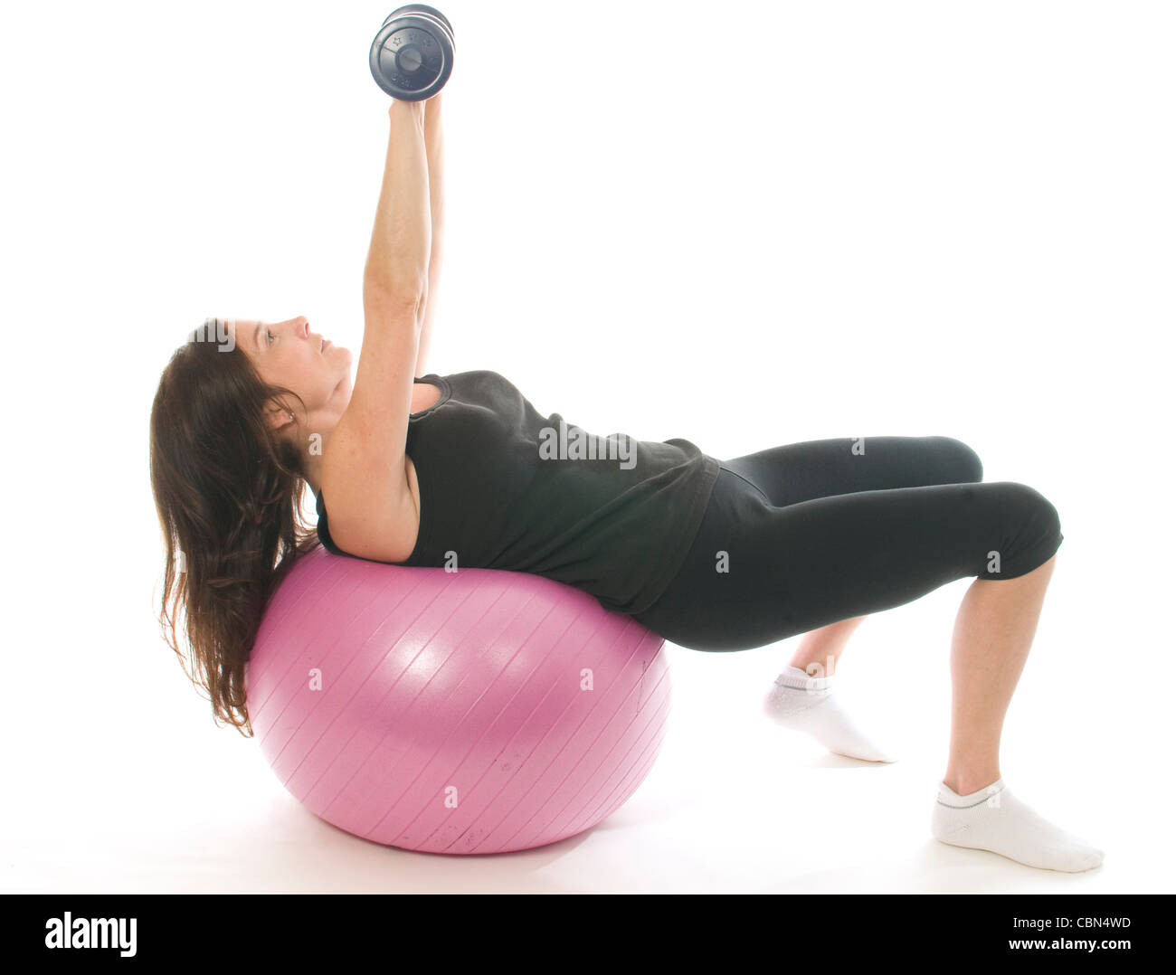 middle age woman fitness exercising strength training with dumbbell ...