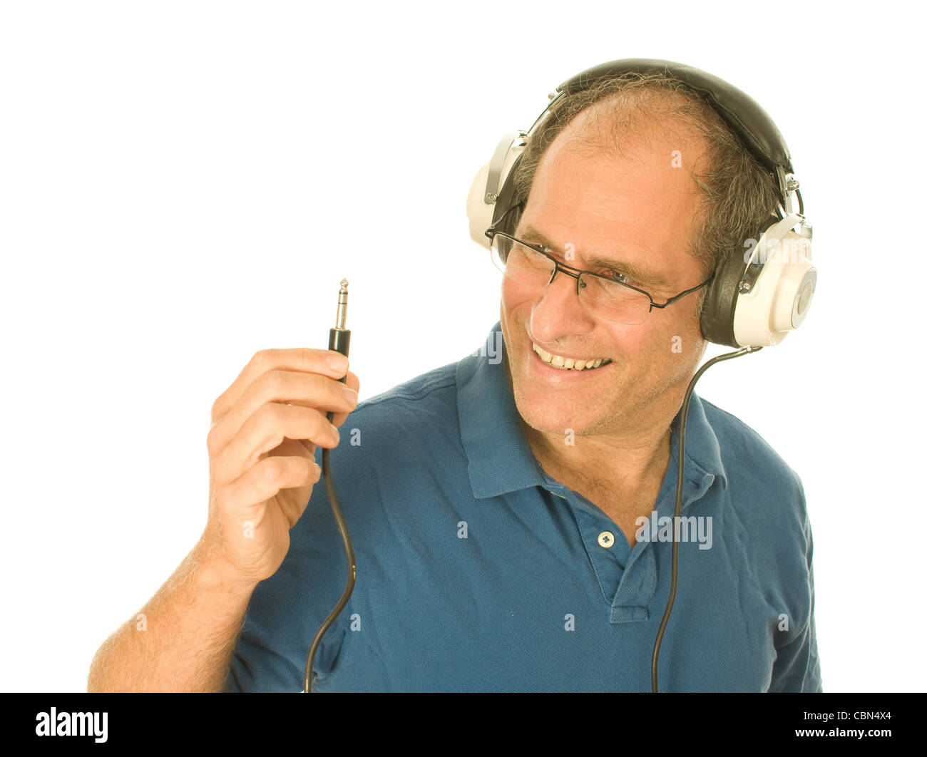 Senior man wearing head phones hi-res stock photography and images - Alamy